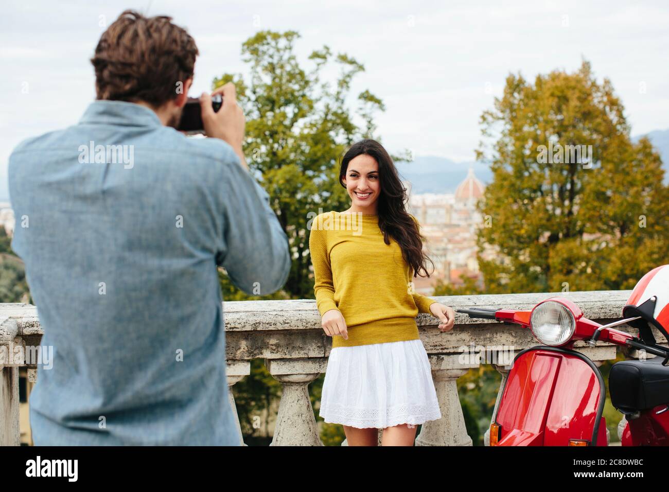 Man Photographing His Girlfriend High Resolution Stock Photography and ...