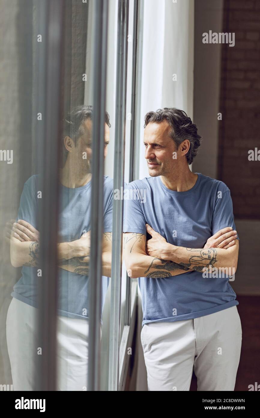 Shadow man standing looking out hi-res stock photography and images - Alamy