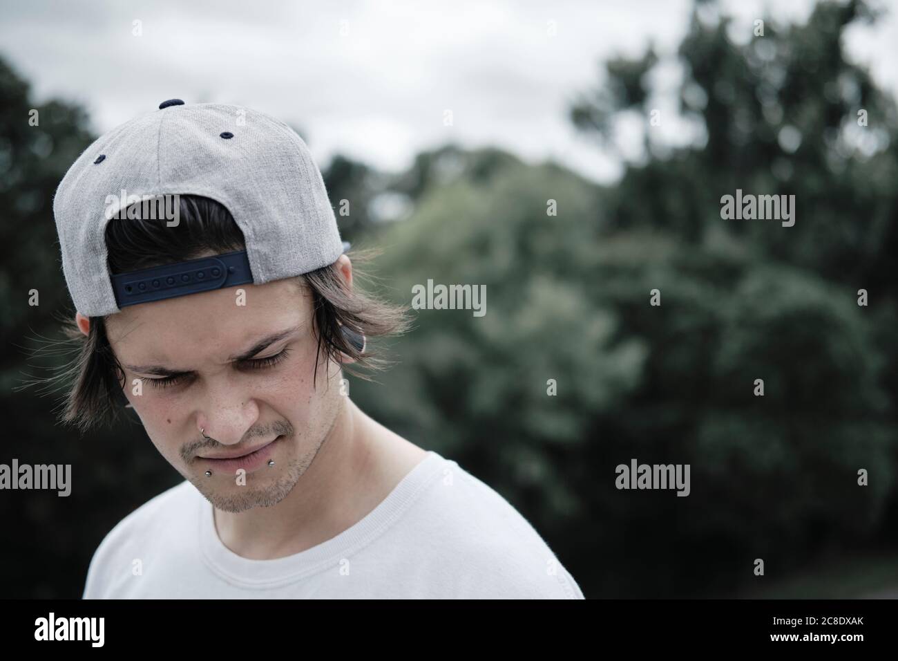 Sideways baseball cap hi-res stock photography and images - Alamy