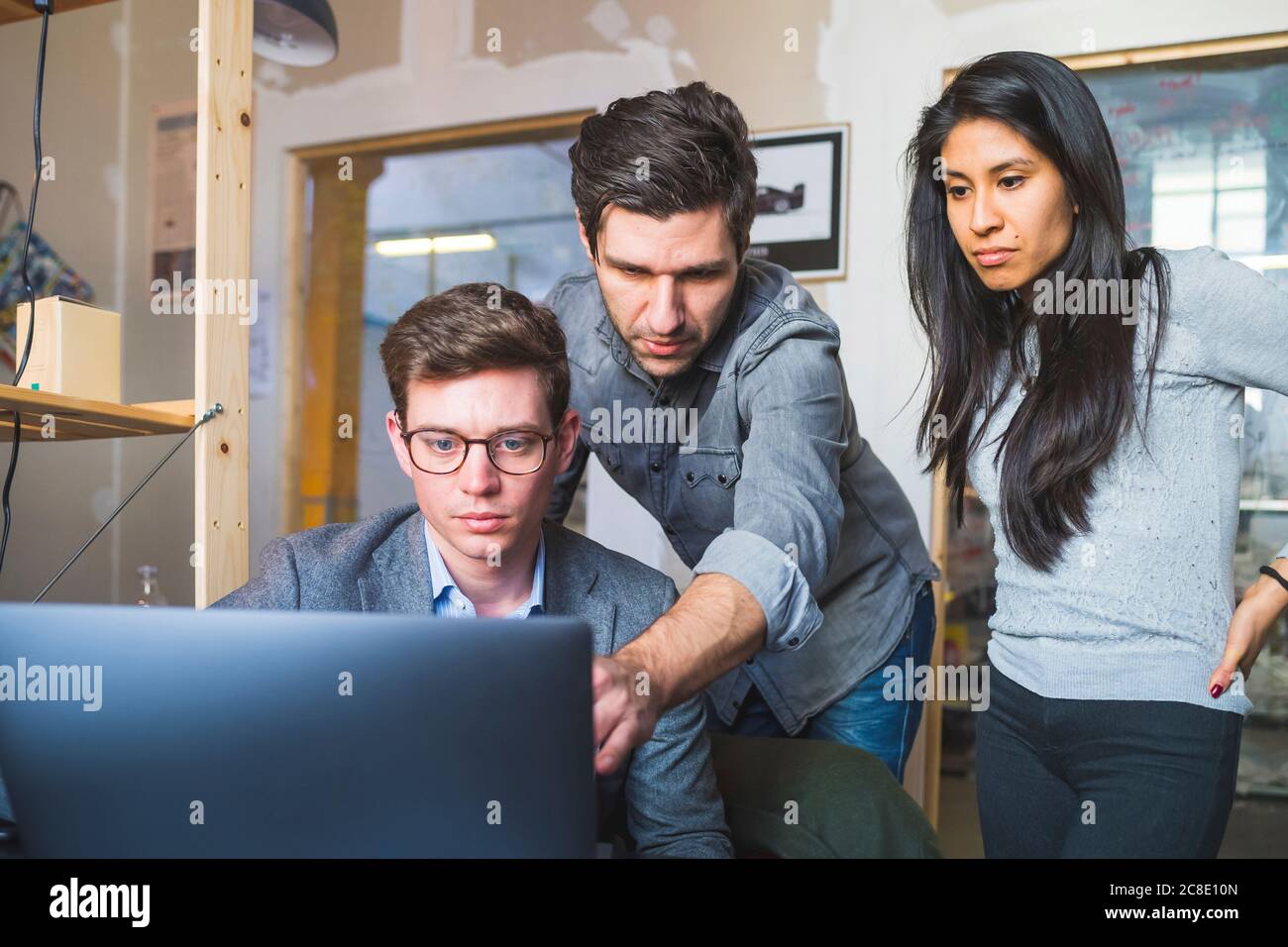 Three people in small hi-res stock photography and images - Alamy