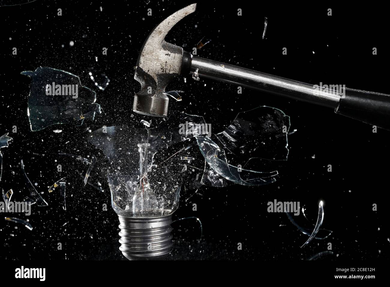 Broken light bulb hammer hi-res stock photography and images - Alamy