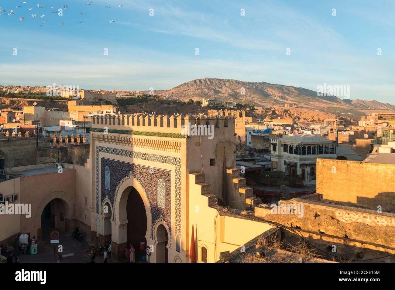 Morocco, Fes-Meknes, Fes, Bab Bou Jeloud city gate at dusk Stock Photo ...