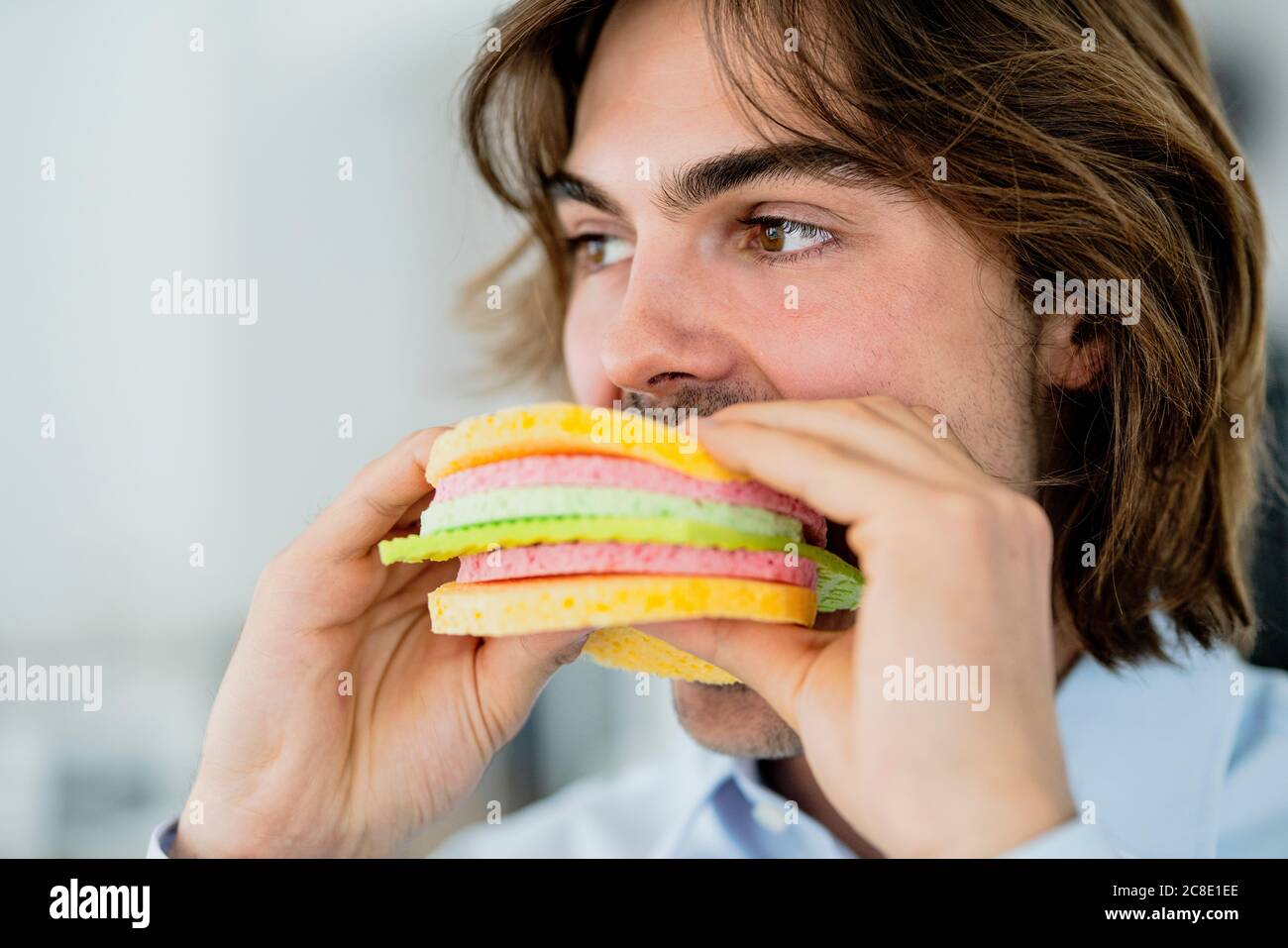 Man eating burger in fast food hi-res stock photography and images - Alamy