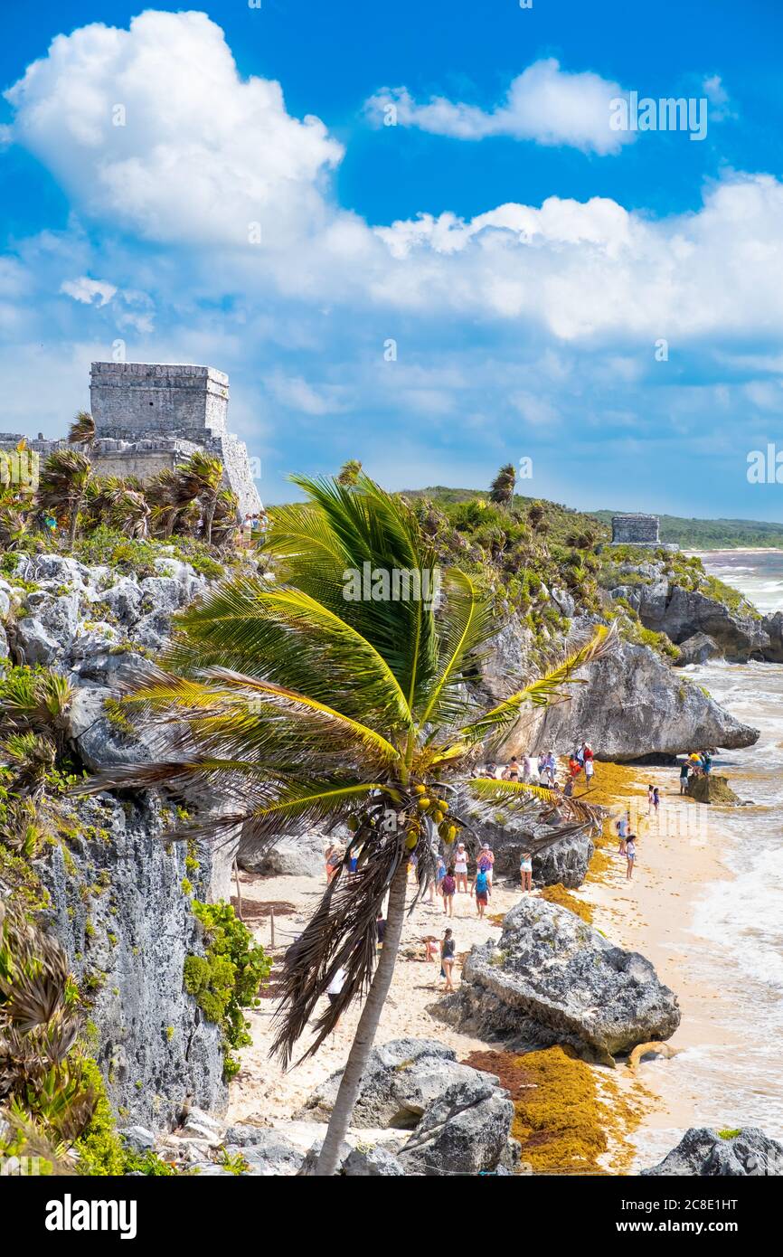 Mayan ruins on a cliff by the sea at the ancient mayan city of Tulum in ...