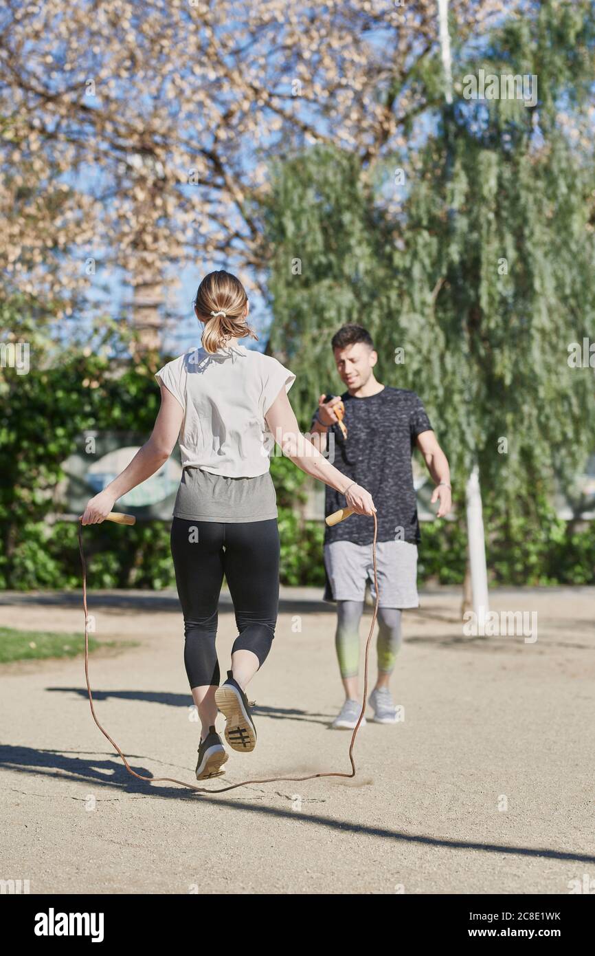 Two People Skipping