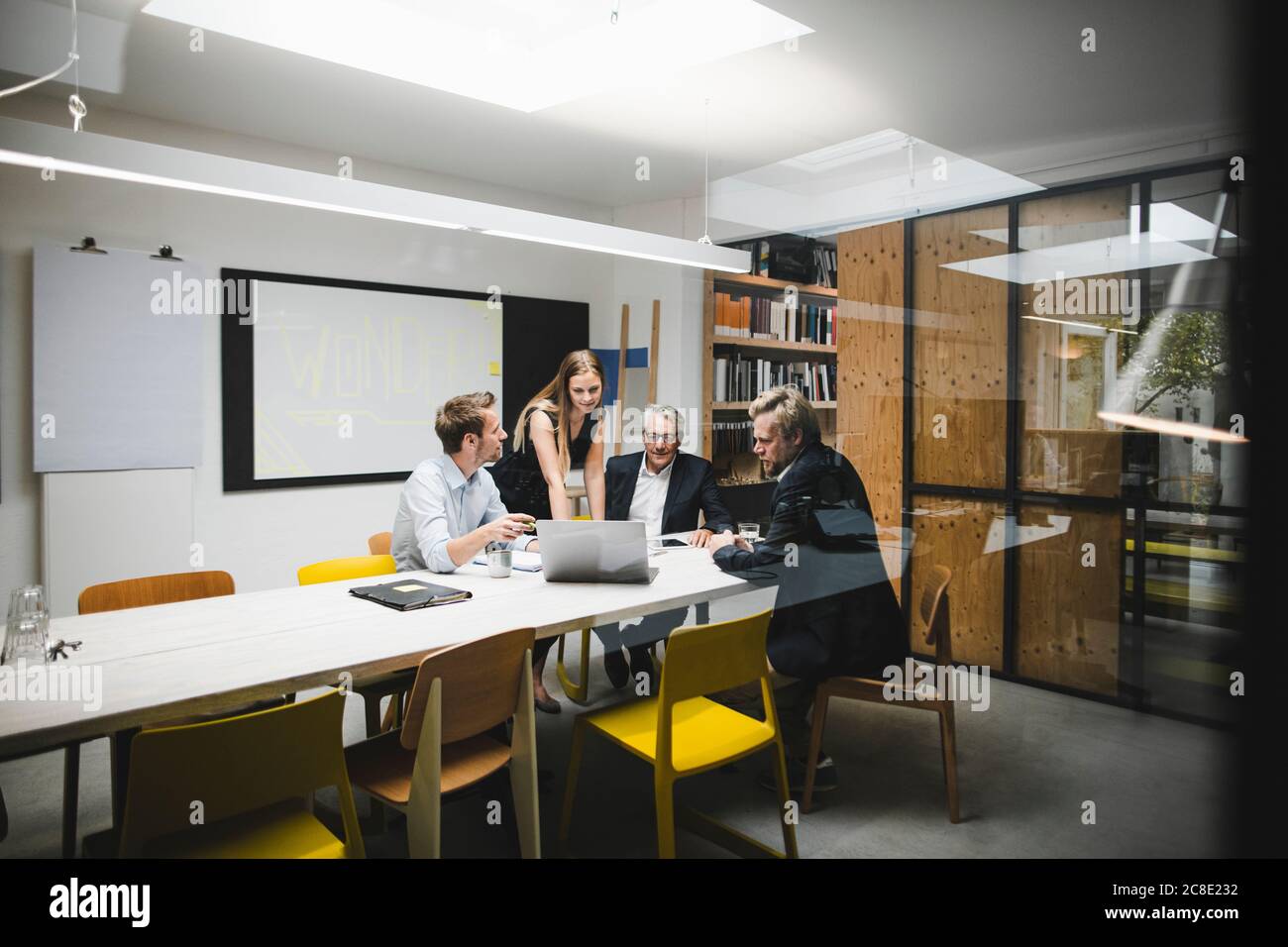 Business people having a client meeting in office Stock Photo - Alamy