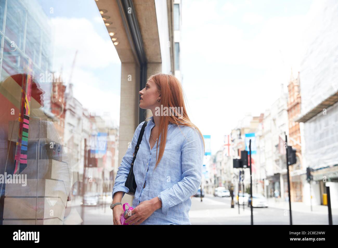 London city view through window hi-res stock photography and images - Alamy