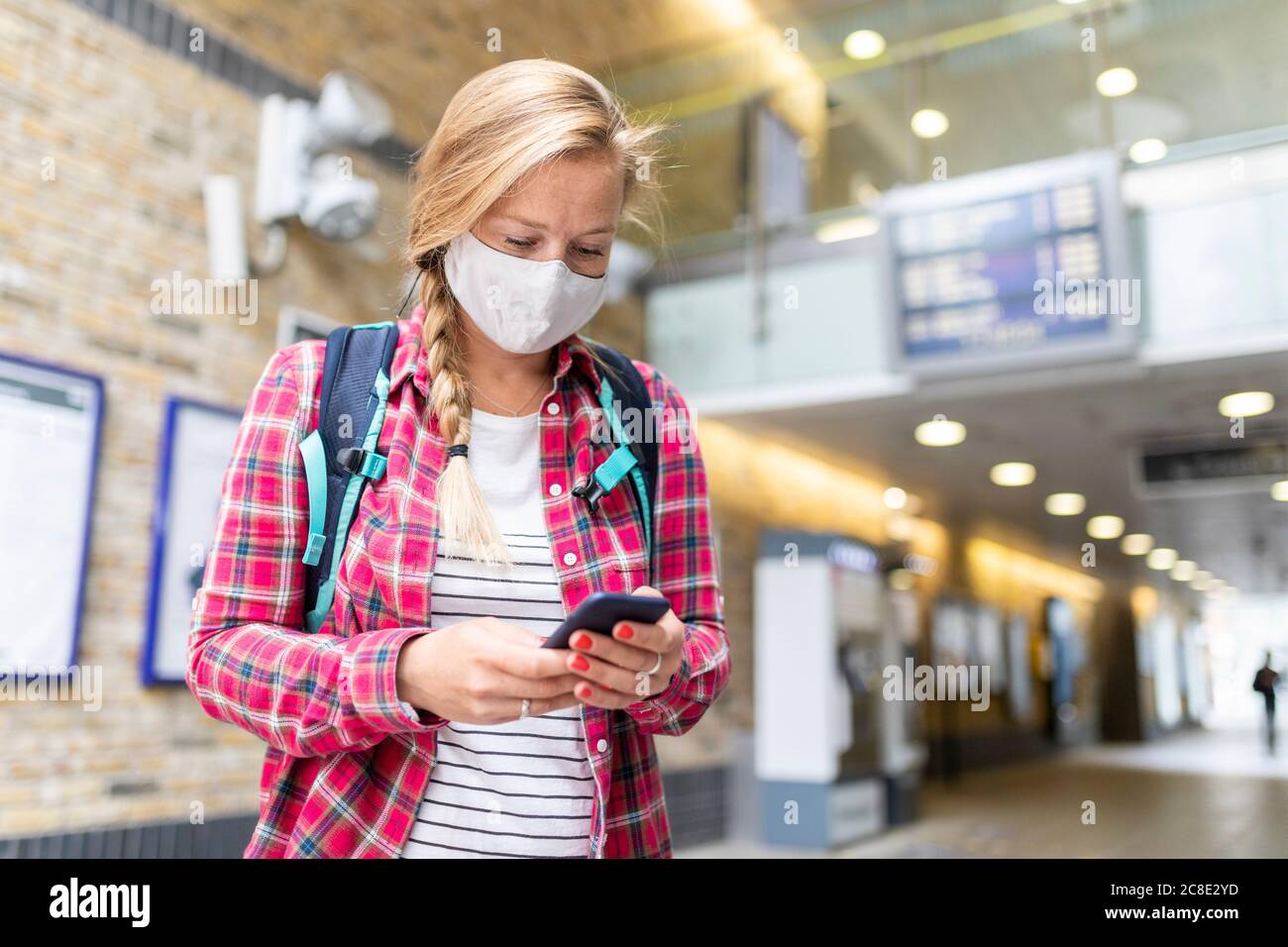 Woman wear mask using hi-res stock photography and images - Alamy