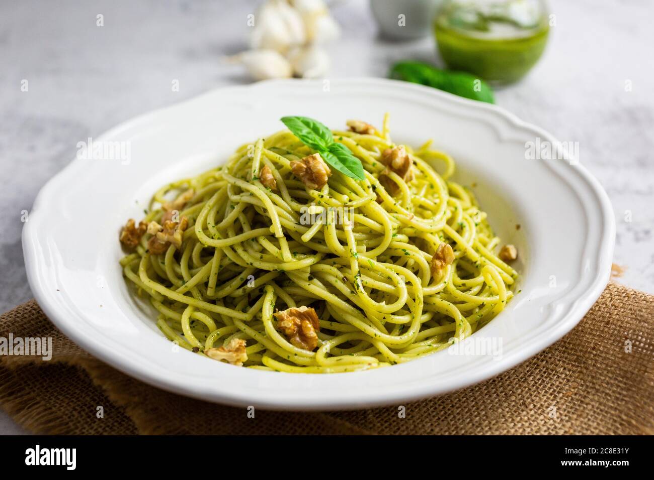 Spaghetti with pesto, walnut, basil and chilli and grana cheese Stock ...