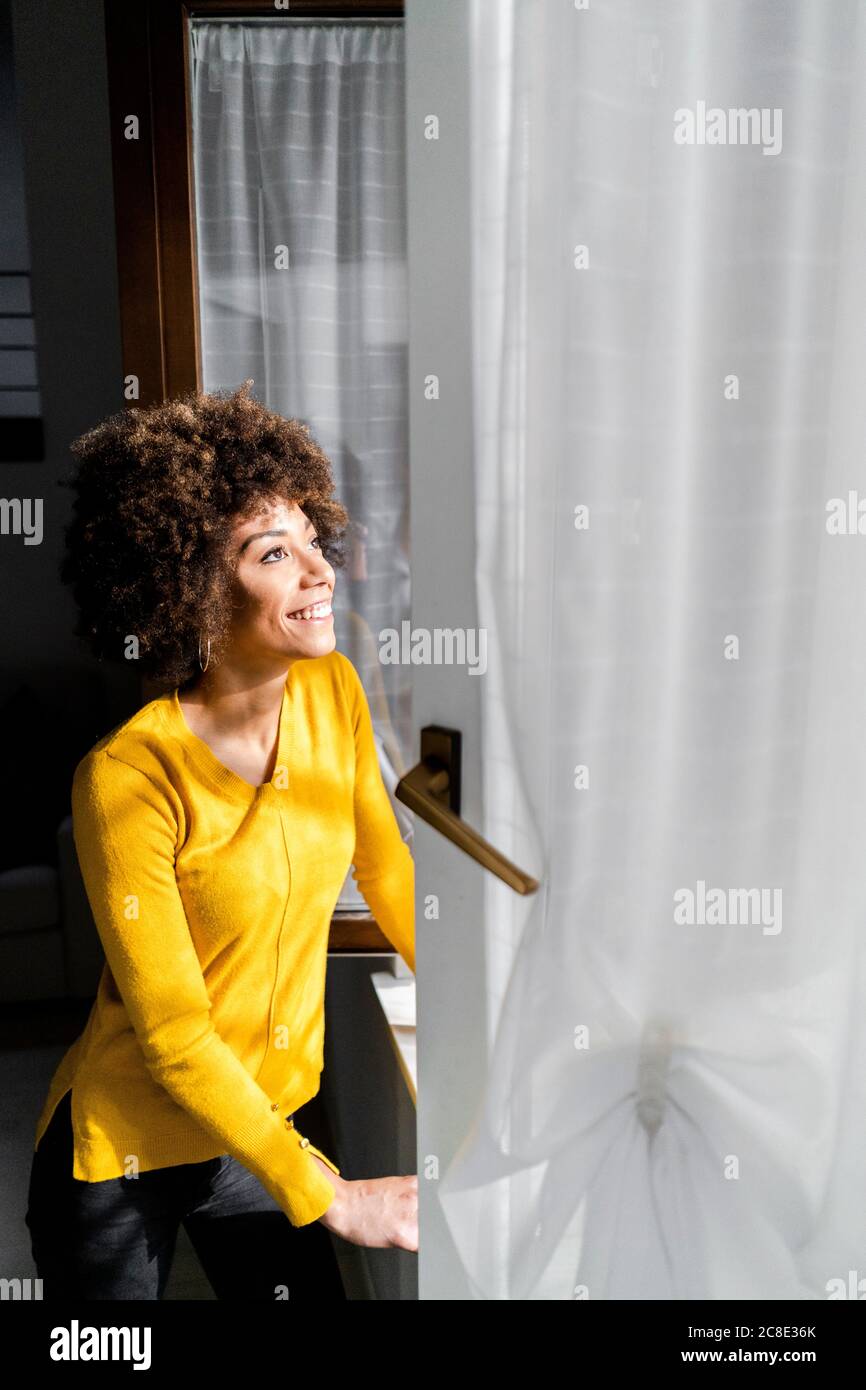 Woman open window home fresh air hi-res stock photography and images ...