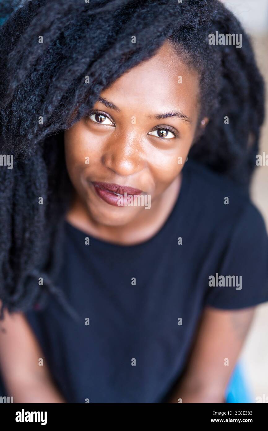 Woman dreadlocks looking camera smiling hi-res stock photography and ...