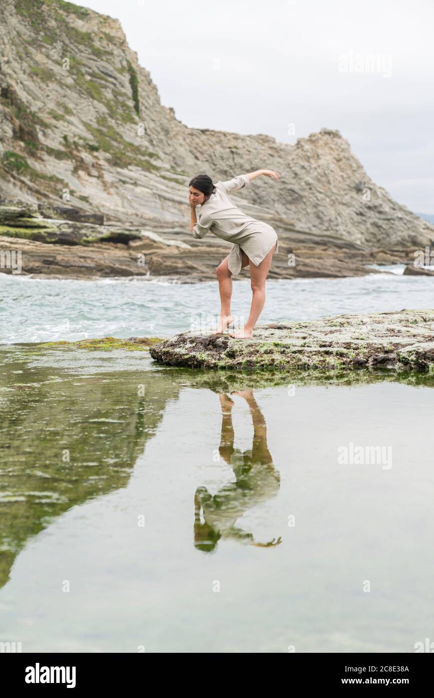 Reflection woman beach hi-res stock photography and images - Alamy