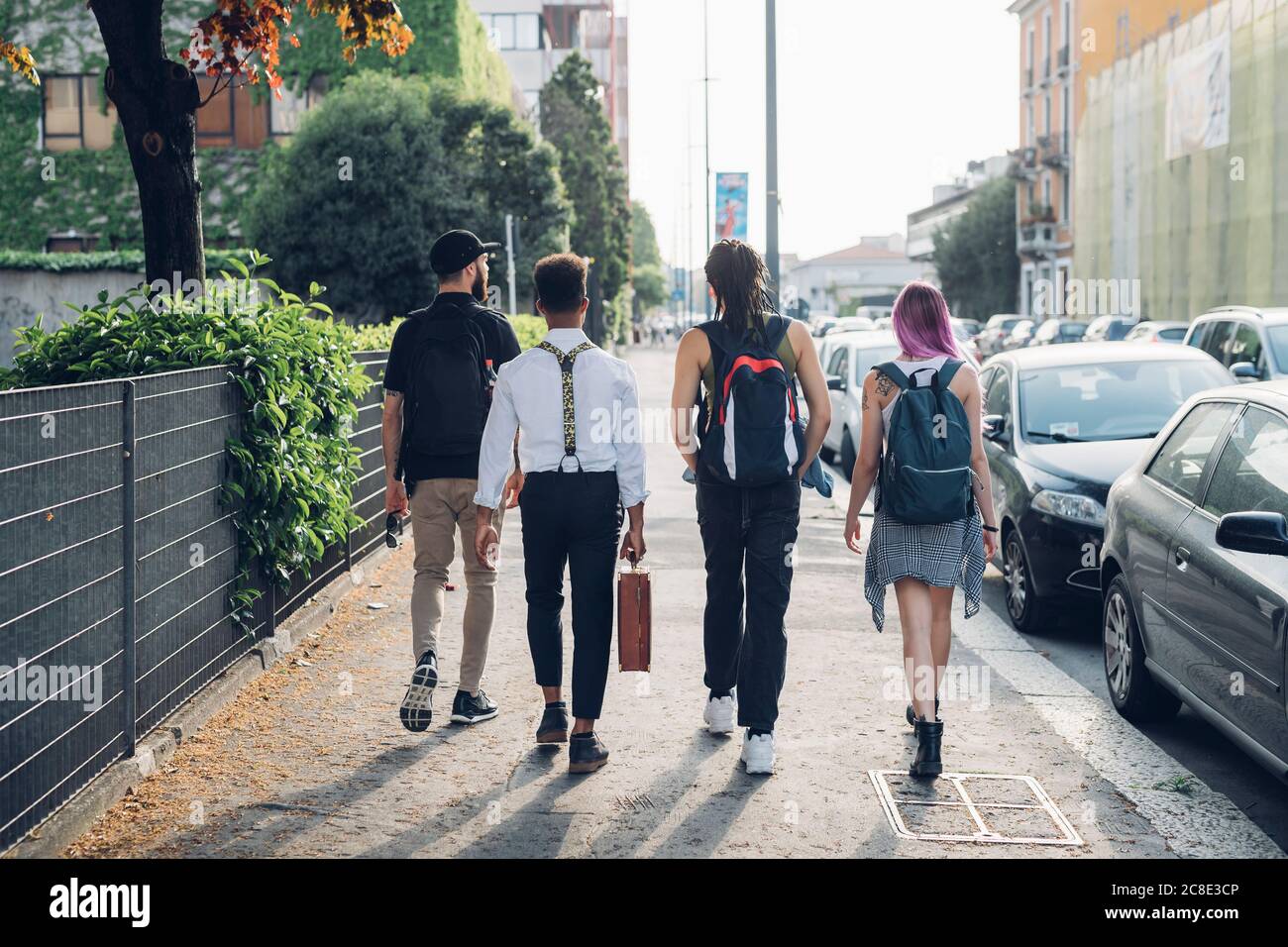 Group of friends walking hi-res stock photography and images - Alamy