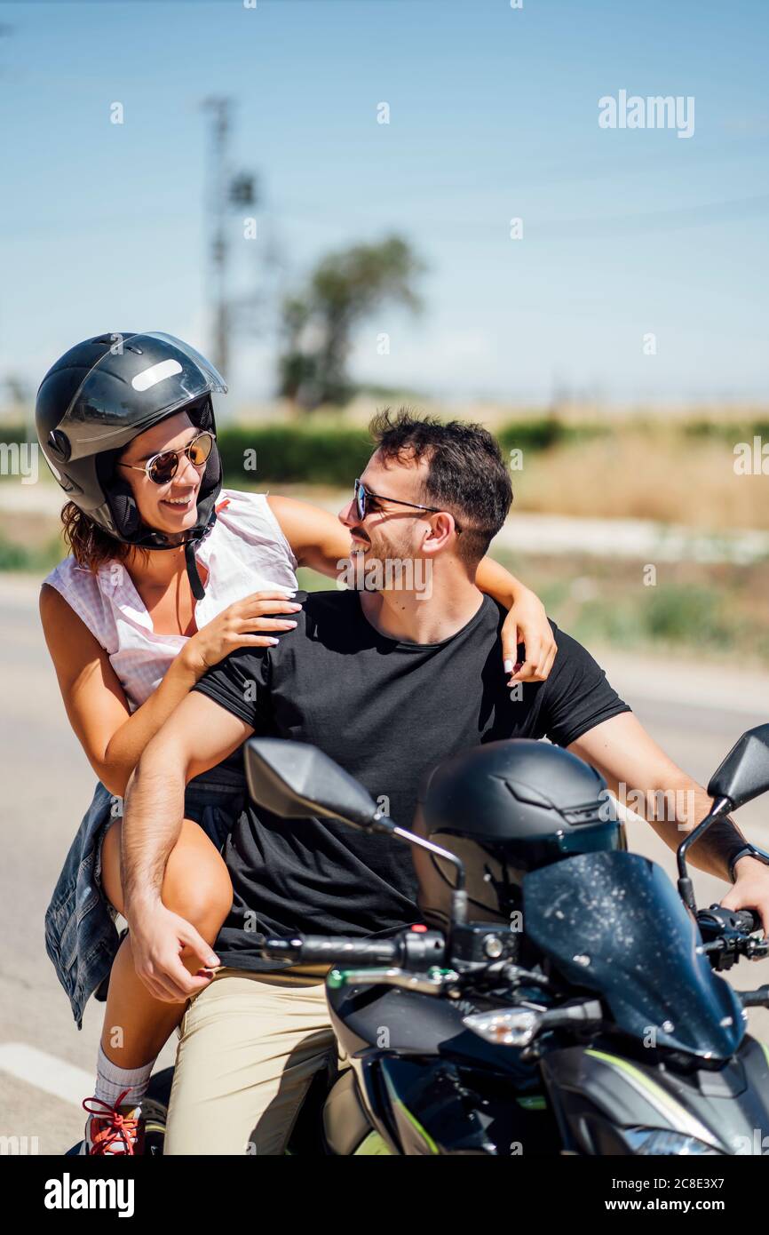 Couple sitting on motorcycle hi-res stock photography and images - Alamy