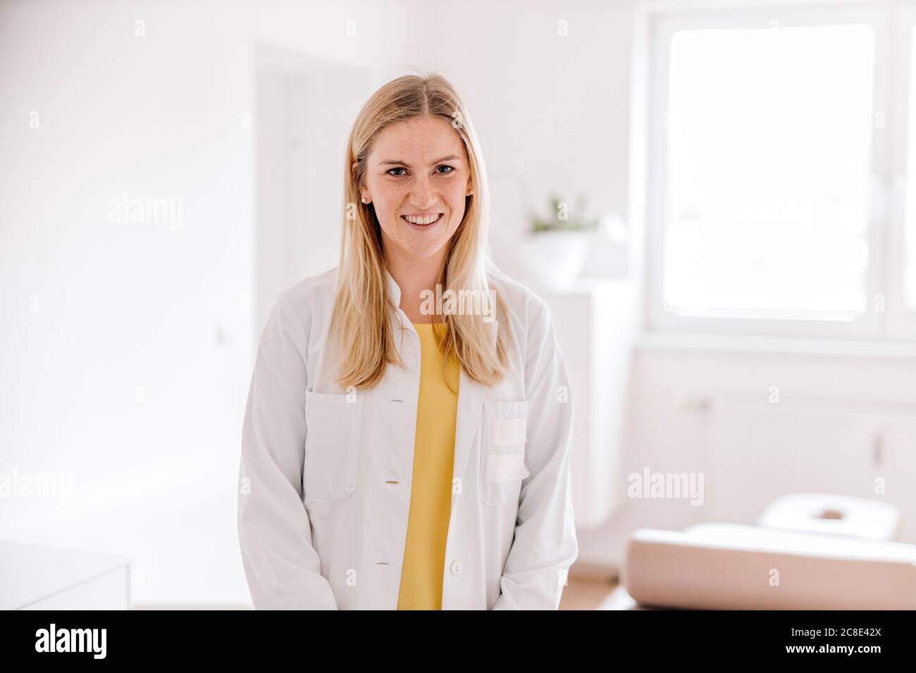Doctor smiling looking camera in hi-res stock photography and images ...