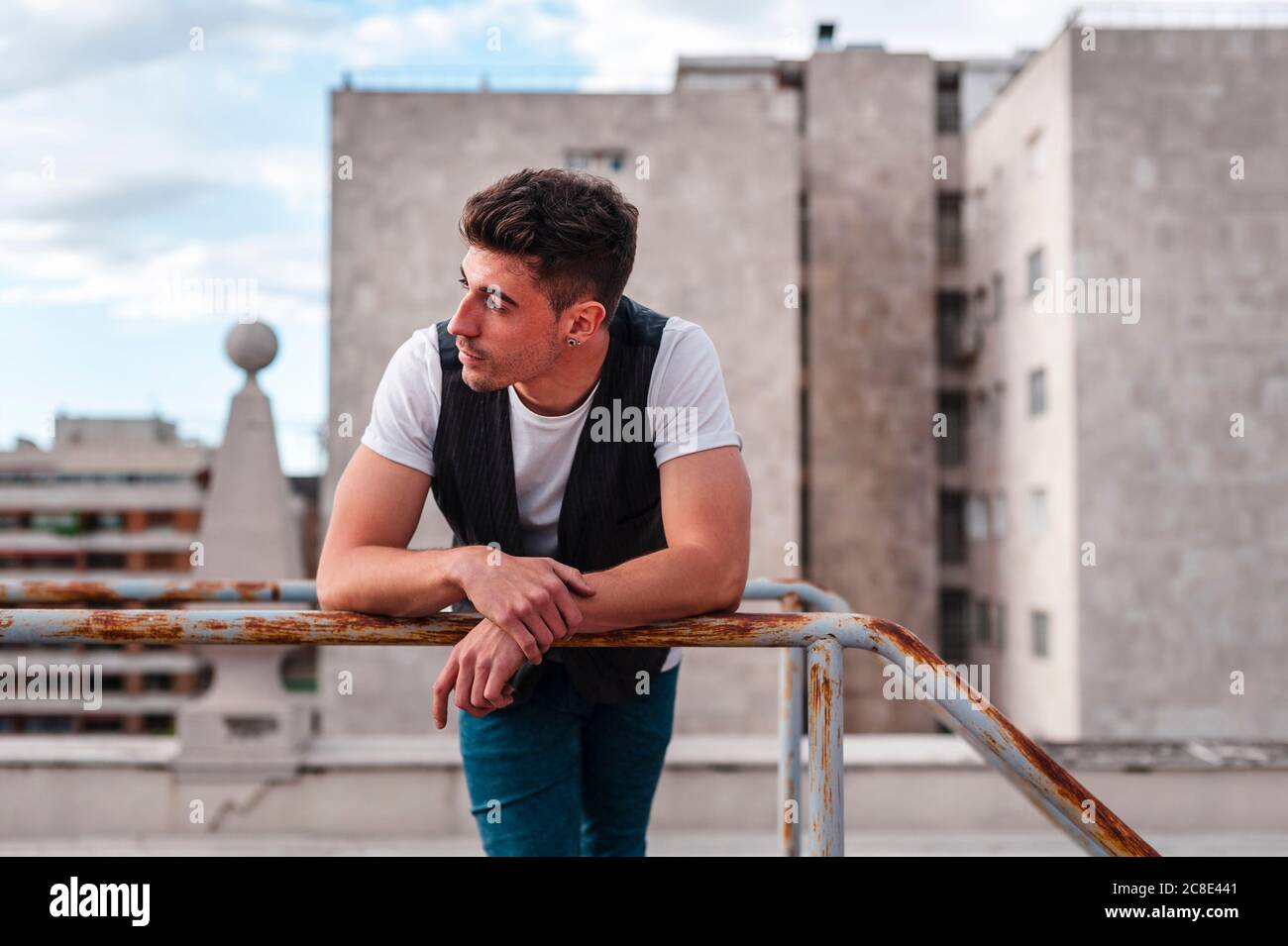 Fashion man standing terrace hi-res stock photography and images - Alamy