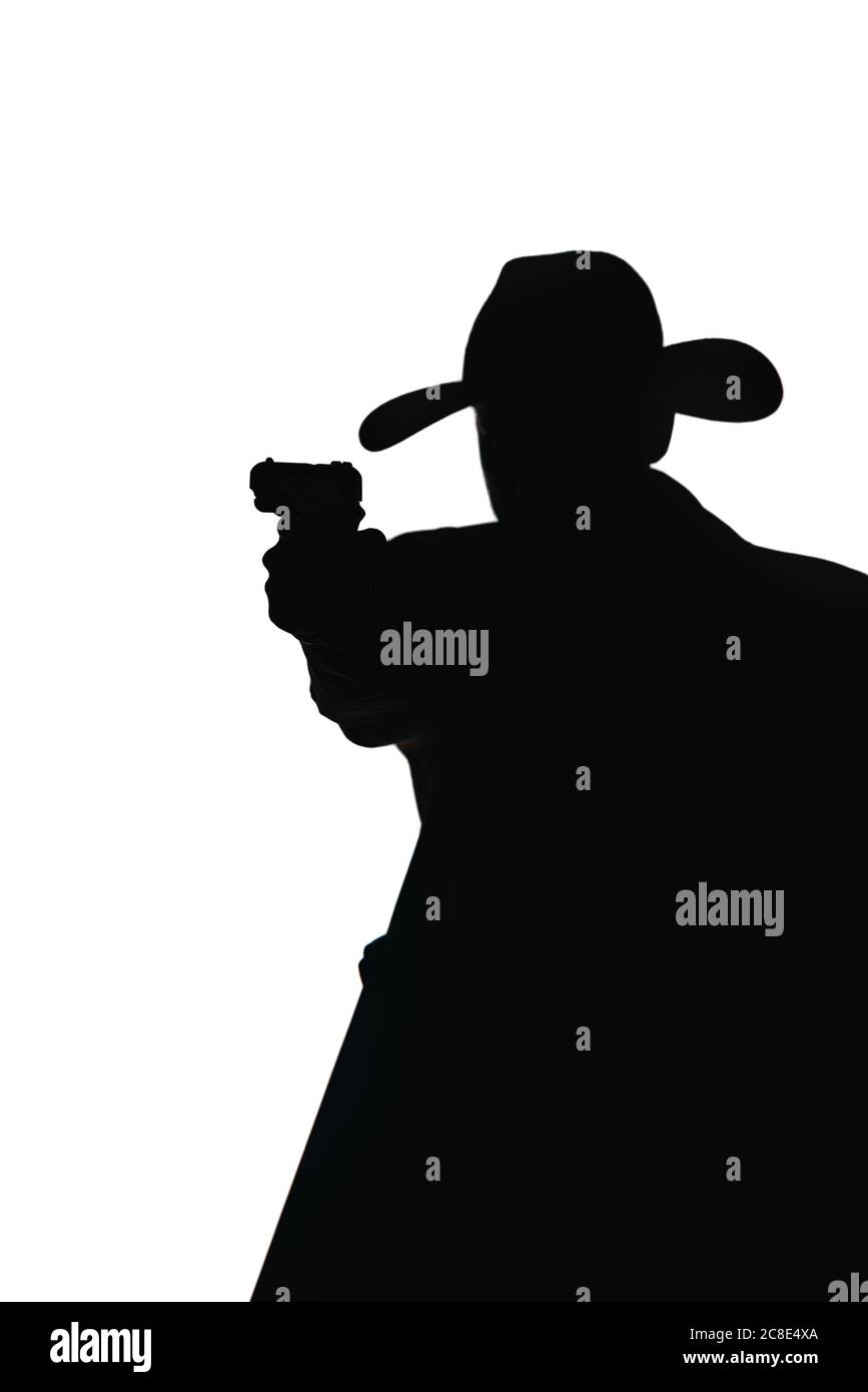 Studio portrait of a cosplayer wearing a fashionable hitman costume ...