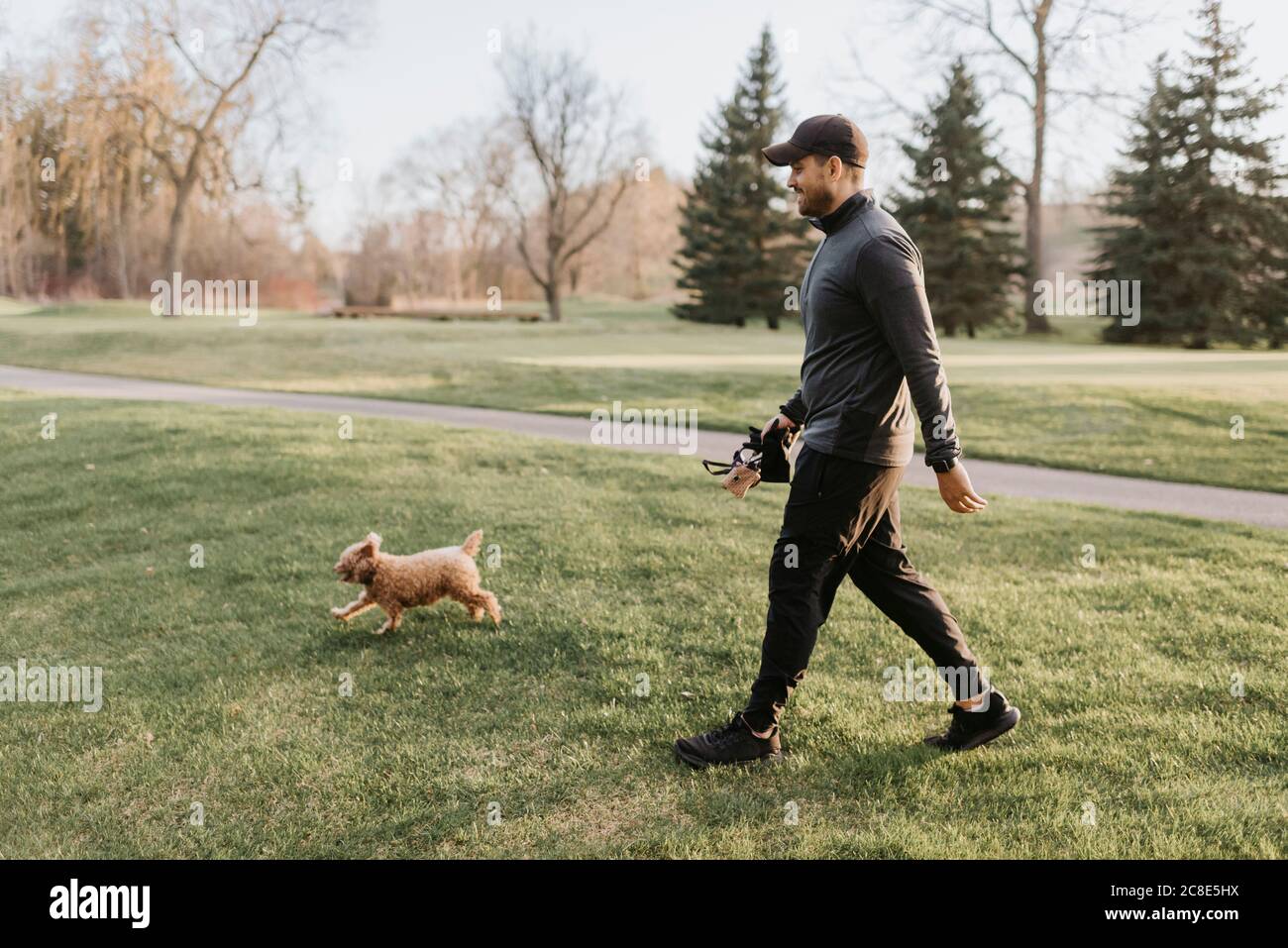 Man and poodle hi-res stock photography and images - Alamy