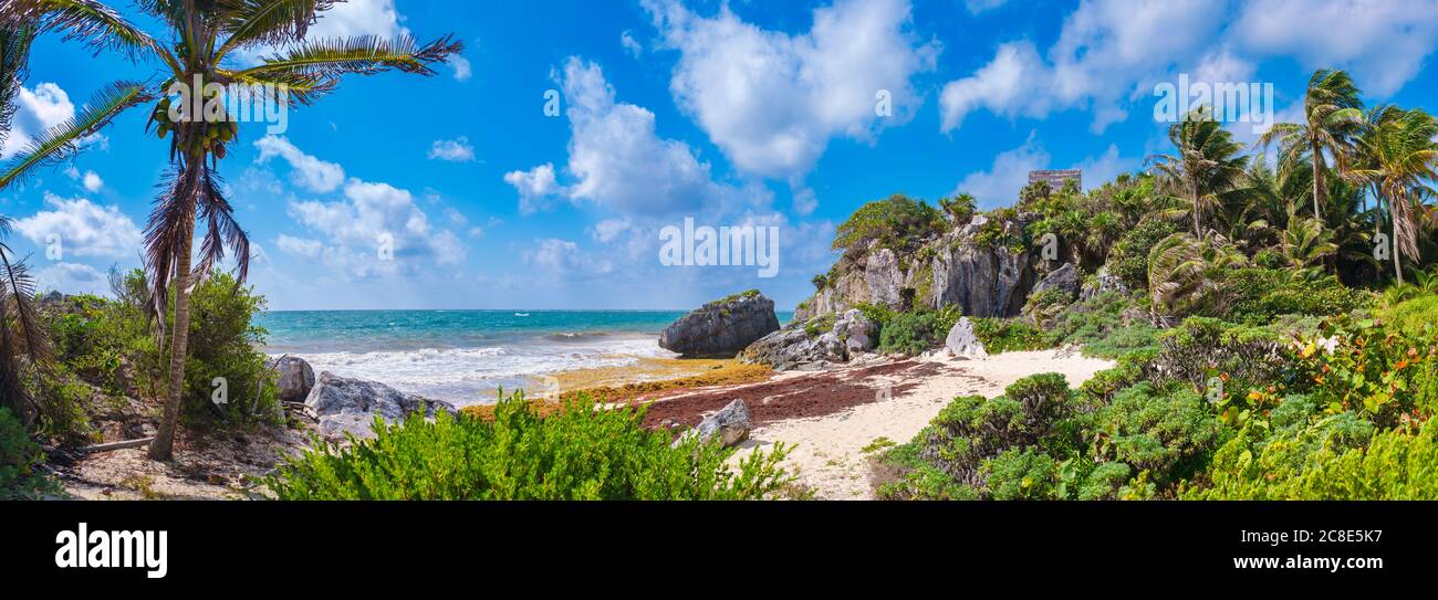 High resolution panoramic view of a beautiful beach and mayan ruins at ...