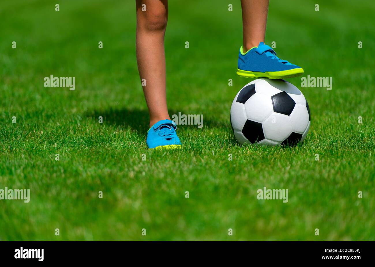 Soccer football player standing feet hi-res stock photography and ...