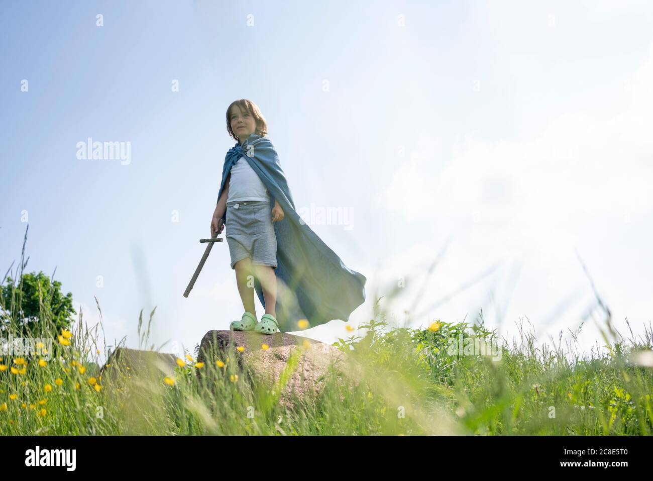 Boy wearing cape hi-res stock photography and images - Alamy