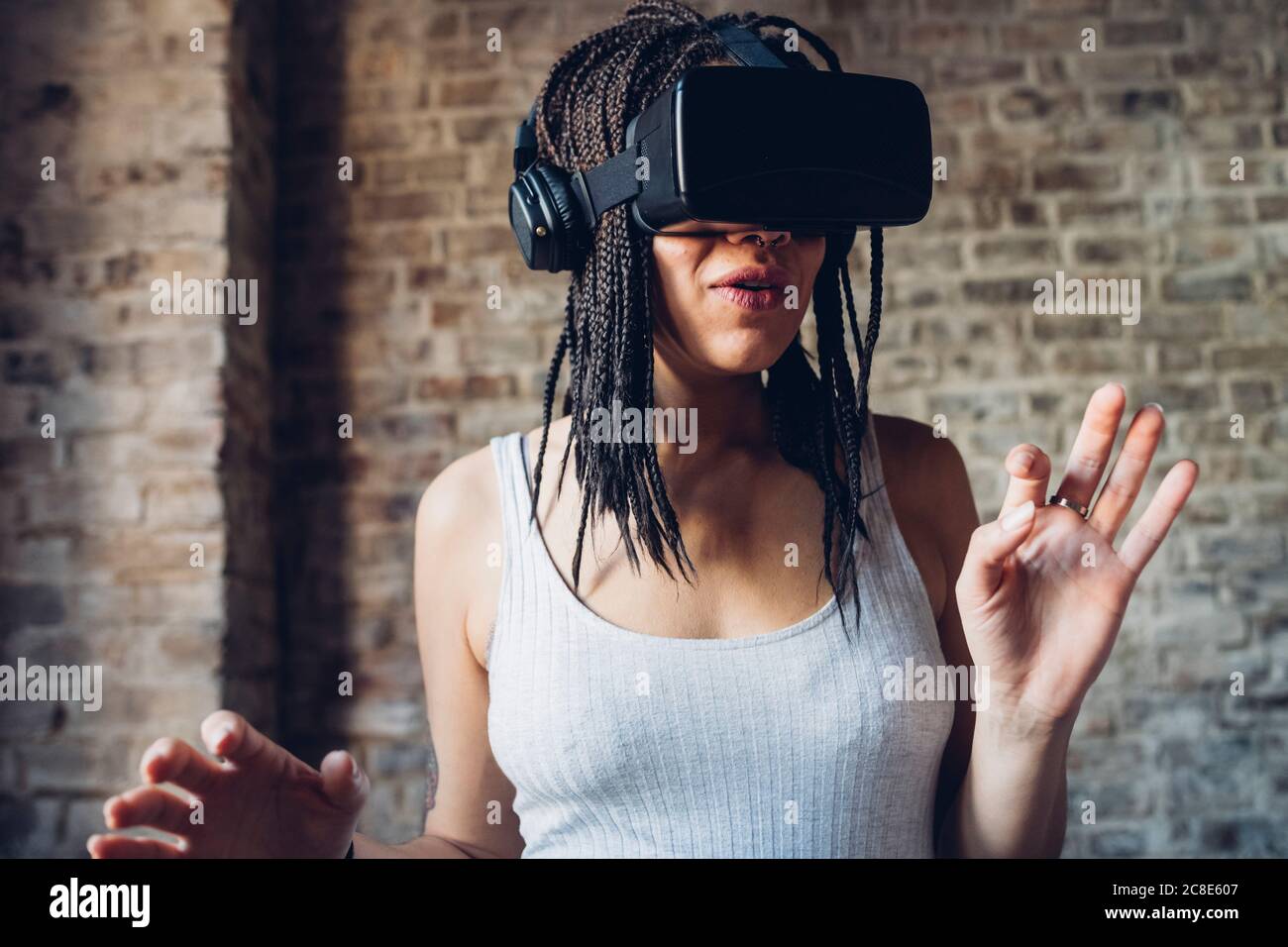 Woman wearing glasses braids hi-res stock photography and images - Alamy
