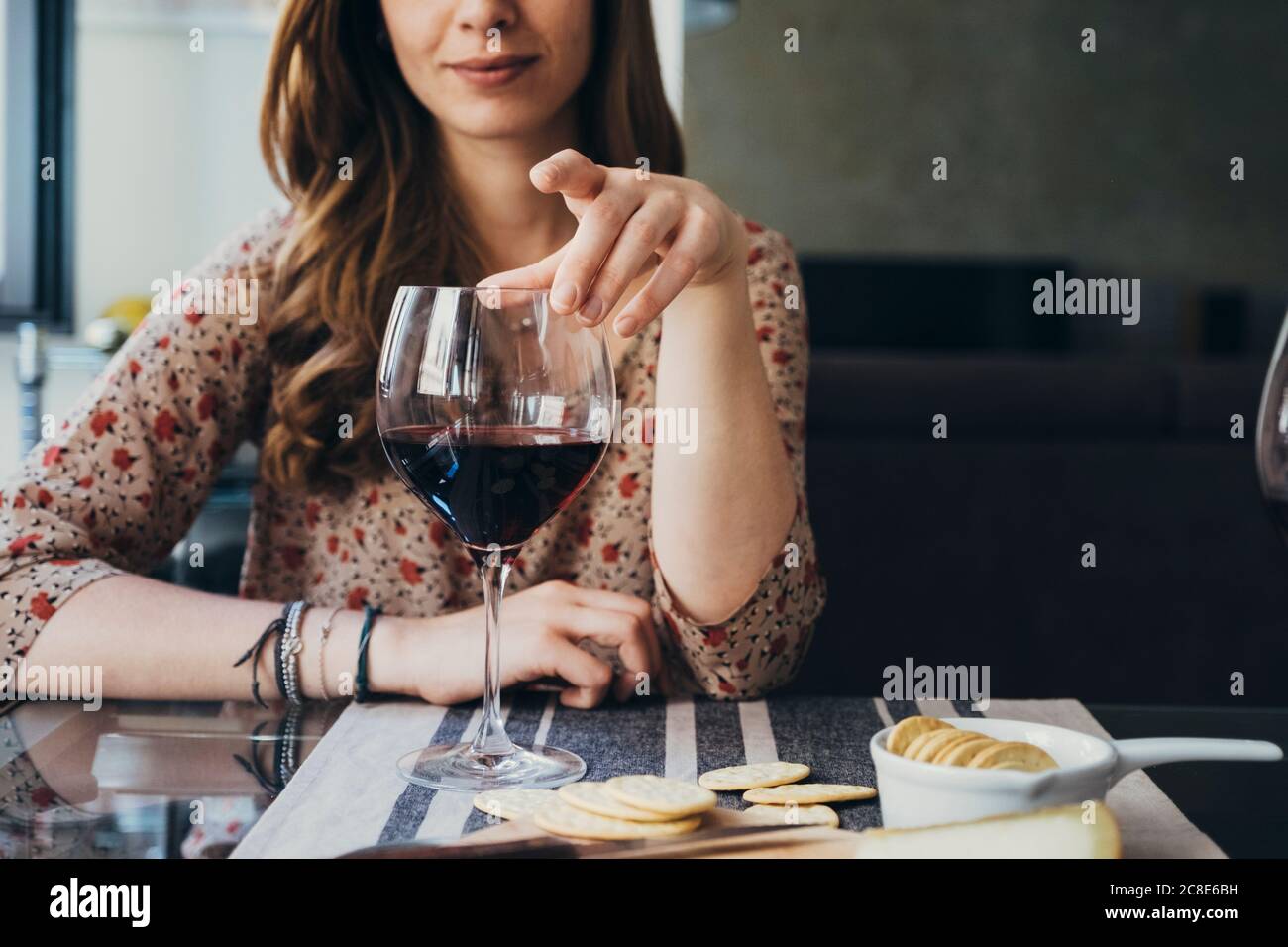 Young woman sitting dining table hi-res stock photography and images ...