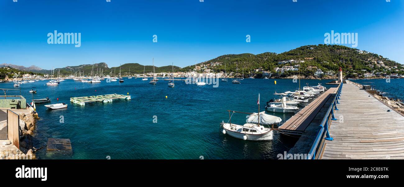 Spain, Mallorca, Andratx, Boats moored in harbor of coastal town in ...