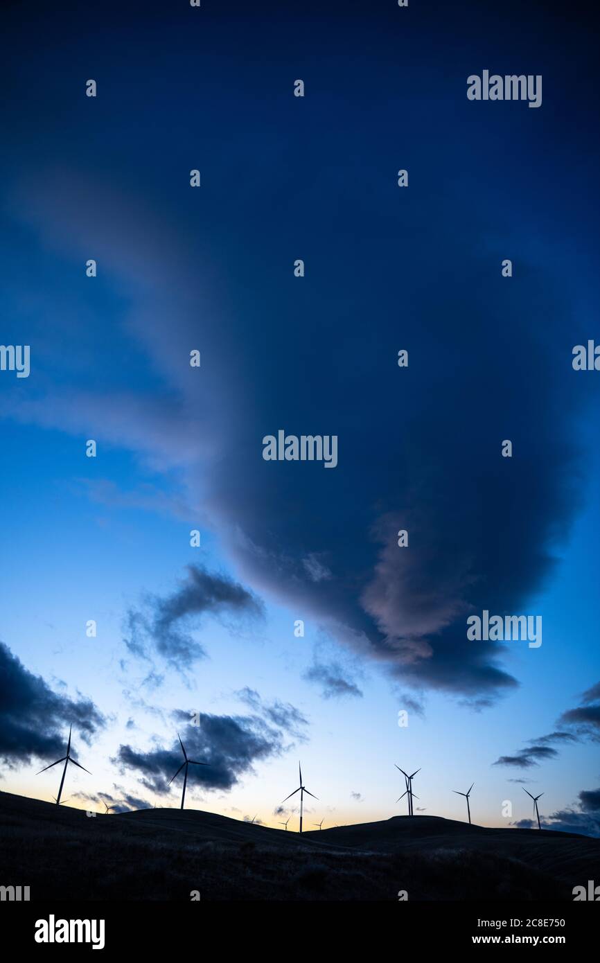 Windmills and Clouds at Sunset Stock Photo - Alamy