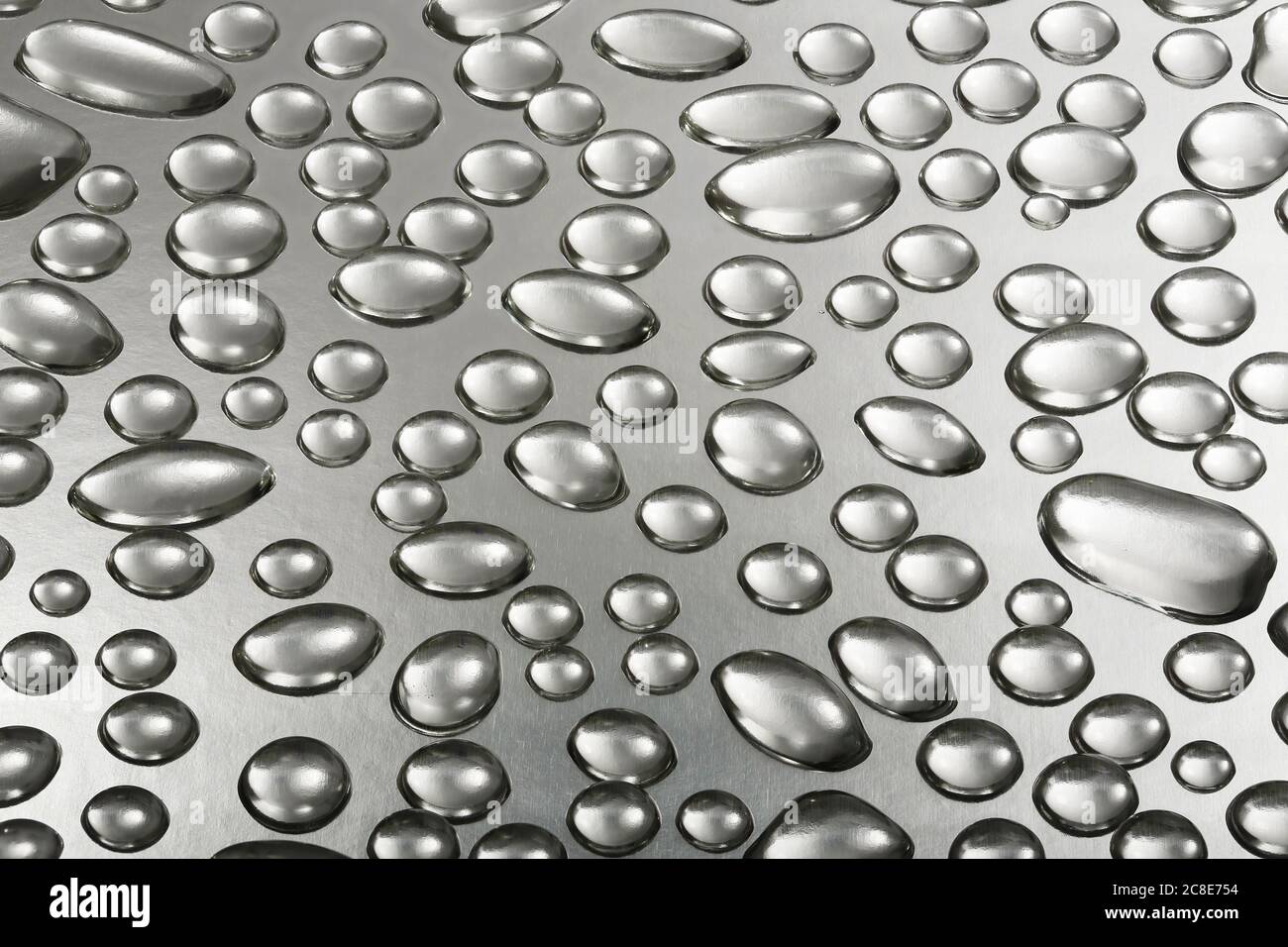 abstract water drops on chrome surface Stock Photo - Alamy