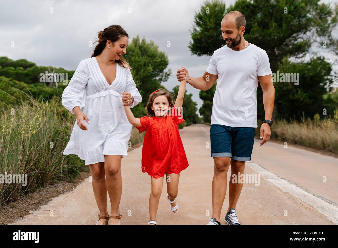 Walking with parents hi-res stock photography and images - Alamy