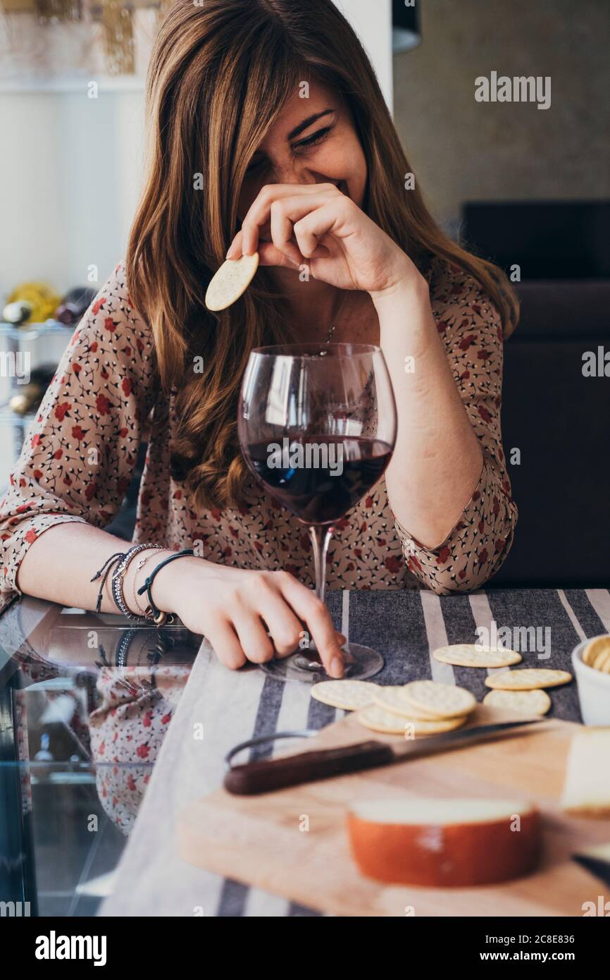 Young woman sitting dining table hi-res stock photography and images ...