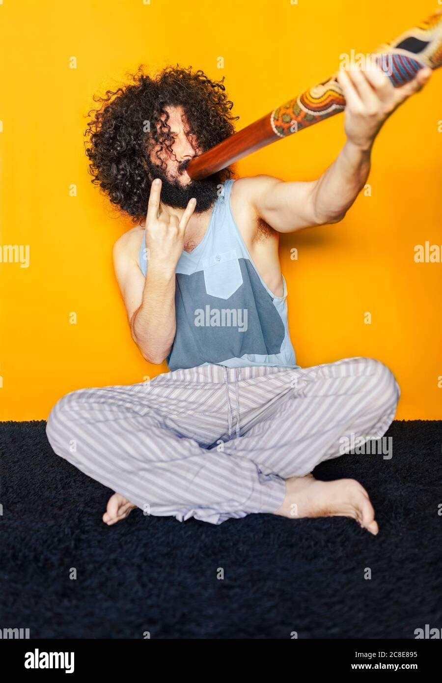 Didgeridoo playing hi-res stock photography and images - Alamy