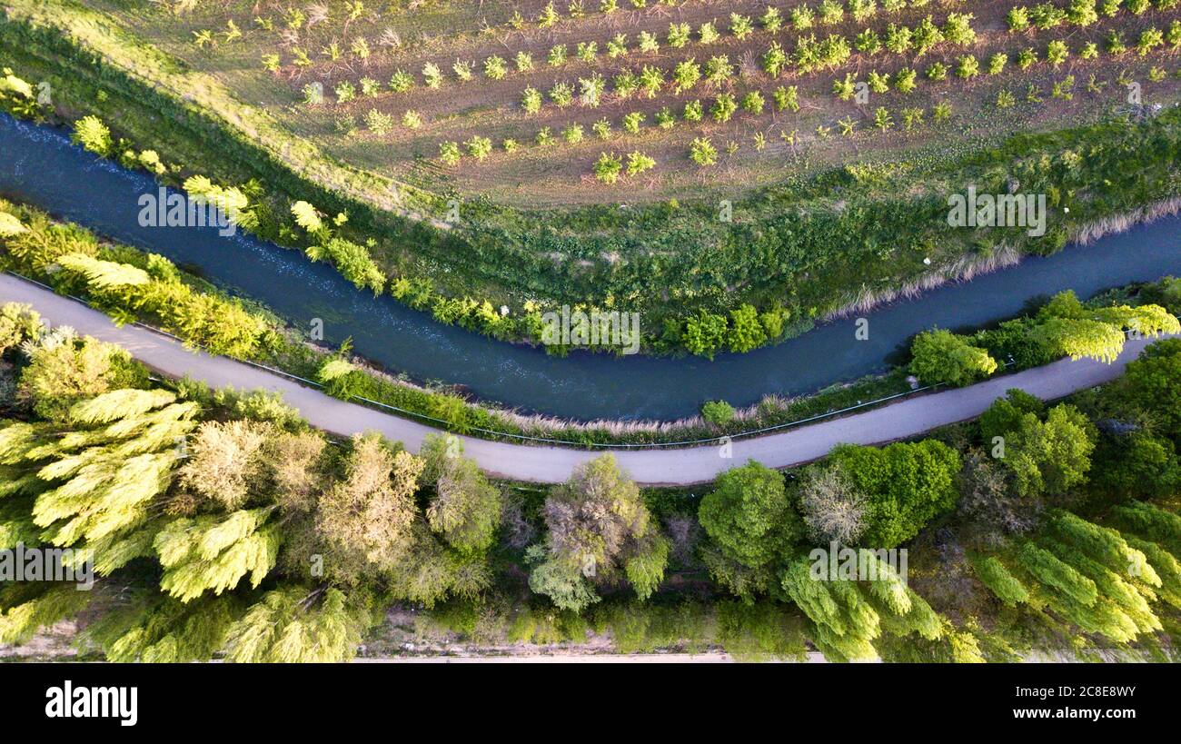 Aerial view of the fruit field, river and pathway at the nature Stock ...