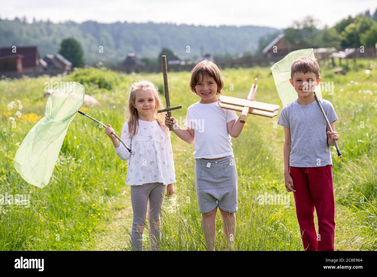 Child holding butterfly hi-res stock photography and images - Alamy