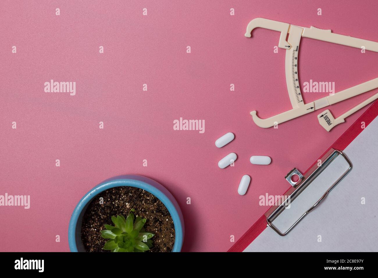 Close up of a tame measurement and body fat caliper Stock Photo - Alamy