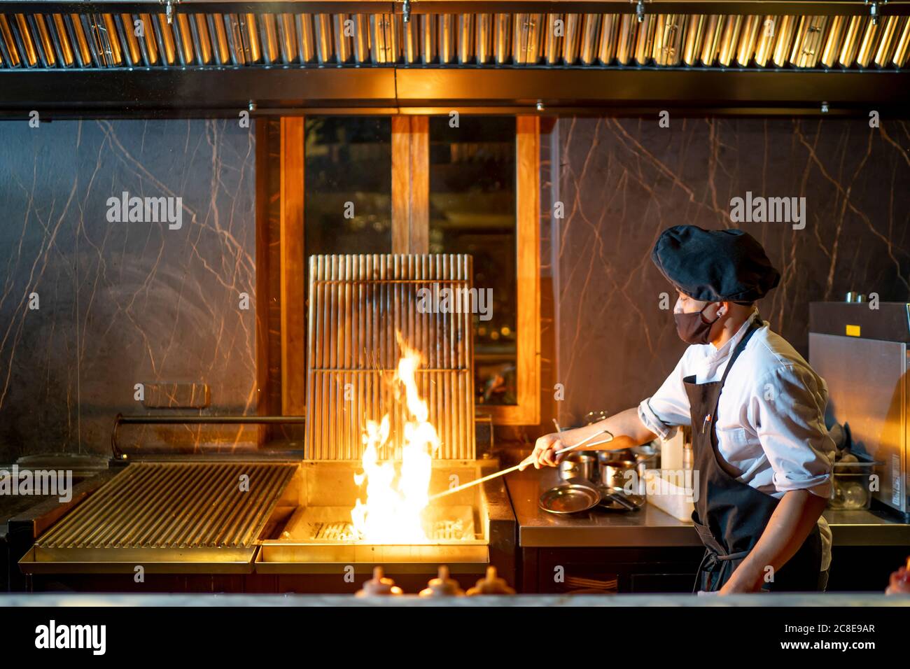 Flame food chef hispanic hi-res stock photography and images - Alamy