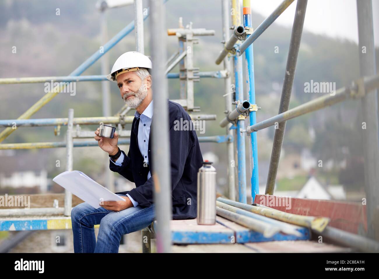 Construction drinking coffee construction site hi-res stock photography ...
