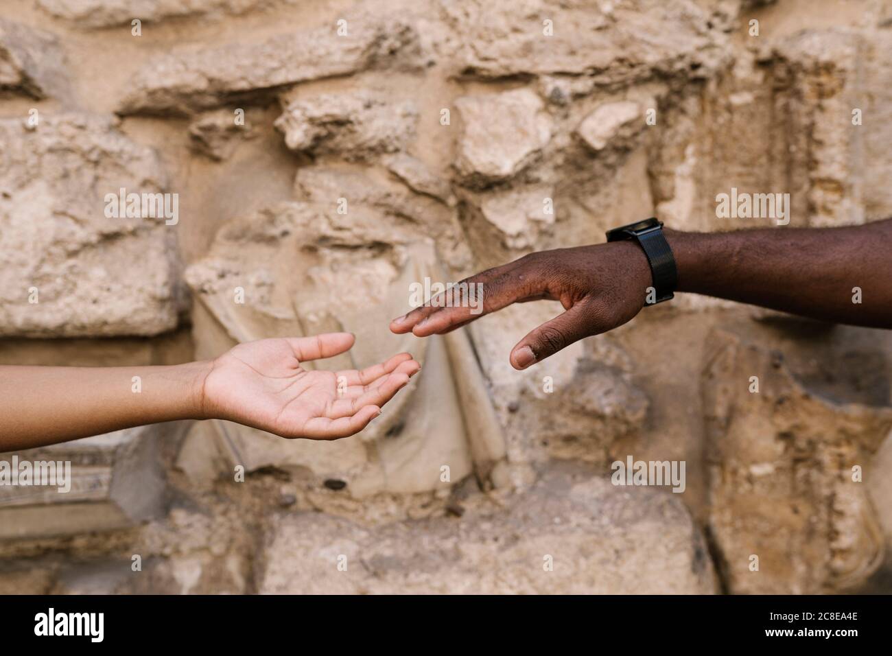 Hands reaching for each other hi-res stock photography and images - Alamy