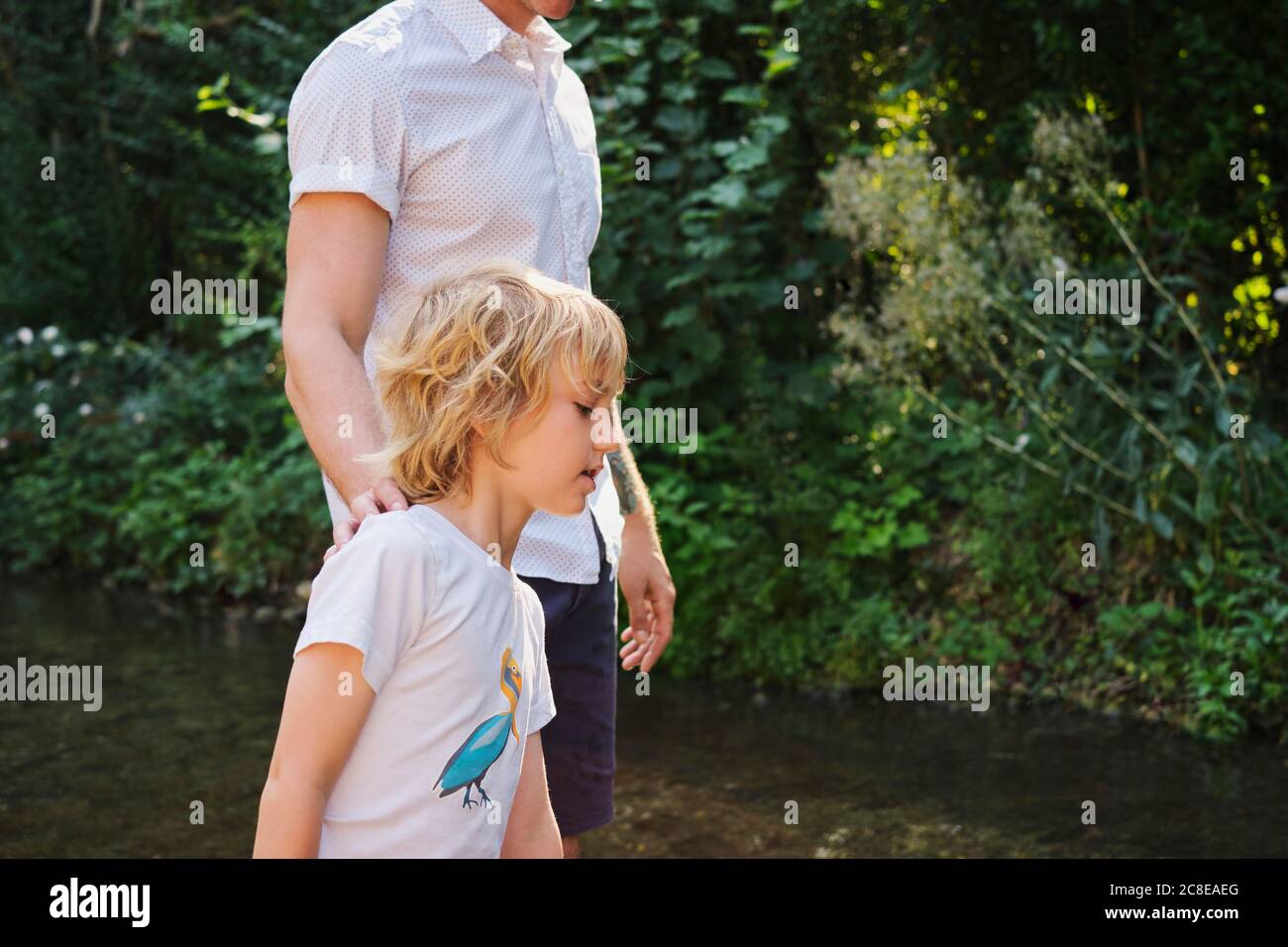 Child walking water in stream hi-res stock photography and images - Alamy