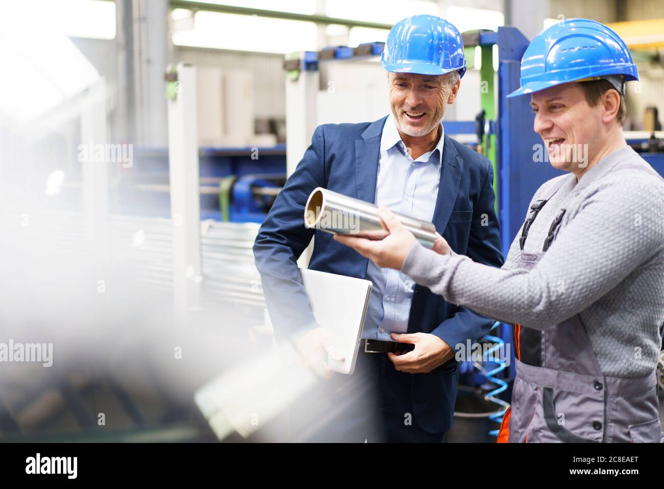 Man holding metal pipe hi-res stock photography and images - Alamy