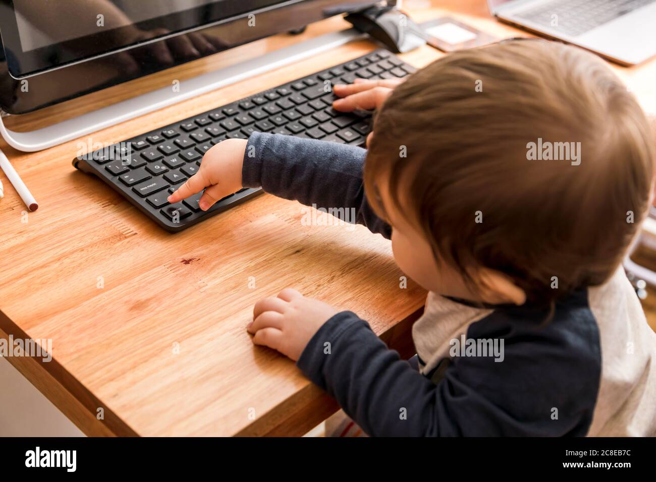 Father computer baby on lap hi-res stock photography and images - Alamy