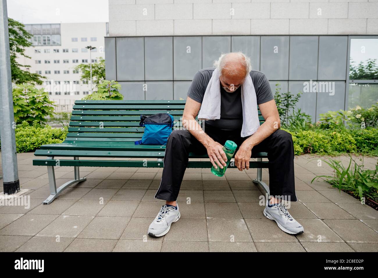 Caucasian men relaxing on bench hi-res stock photography and images - Alamy