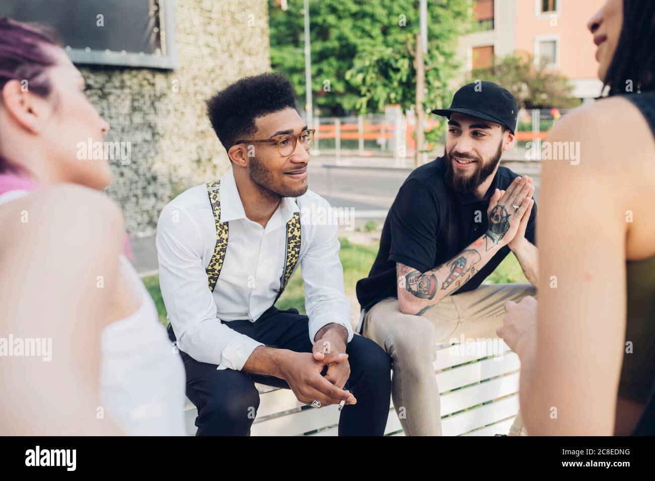 Group of friends meeting in the city Stock Photo - Alamy