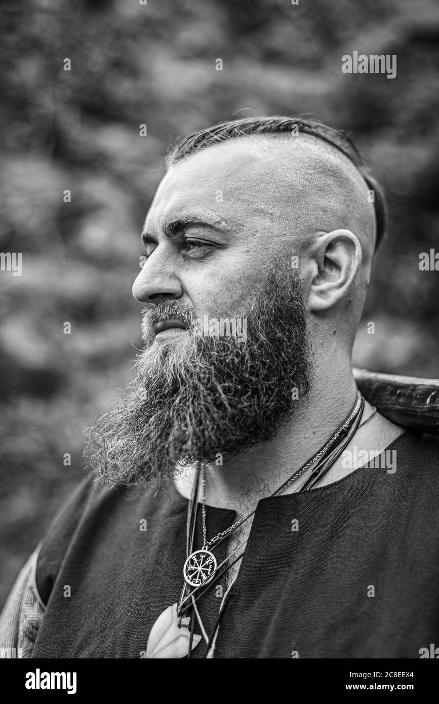 Viking portrait with thick beard, black and white image of historical ...