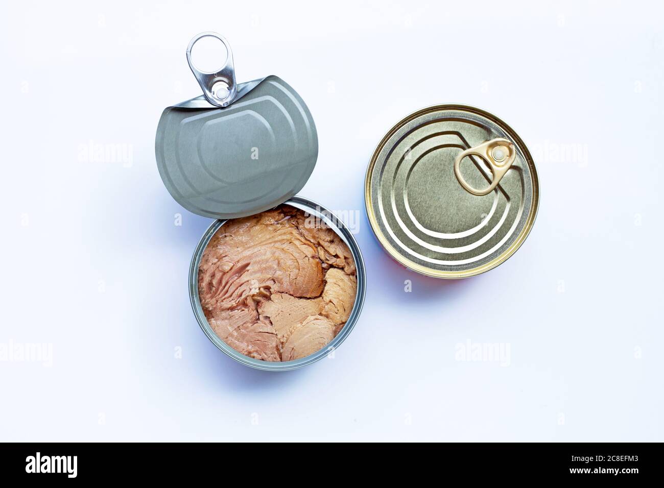 Canned tuna fish on white background. Top view Stock Photo - Alamy