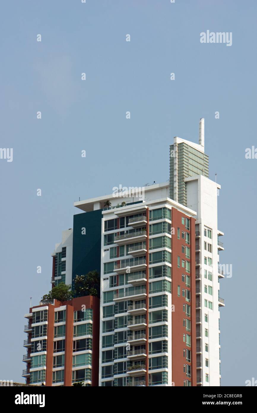 Thai residential apartment block exterior view with a blue sky ...