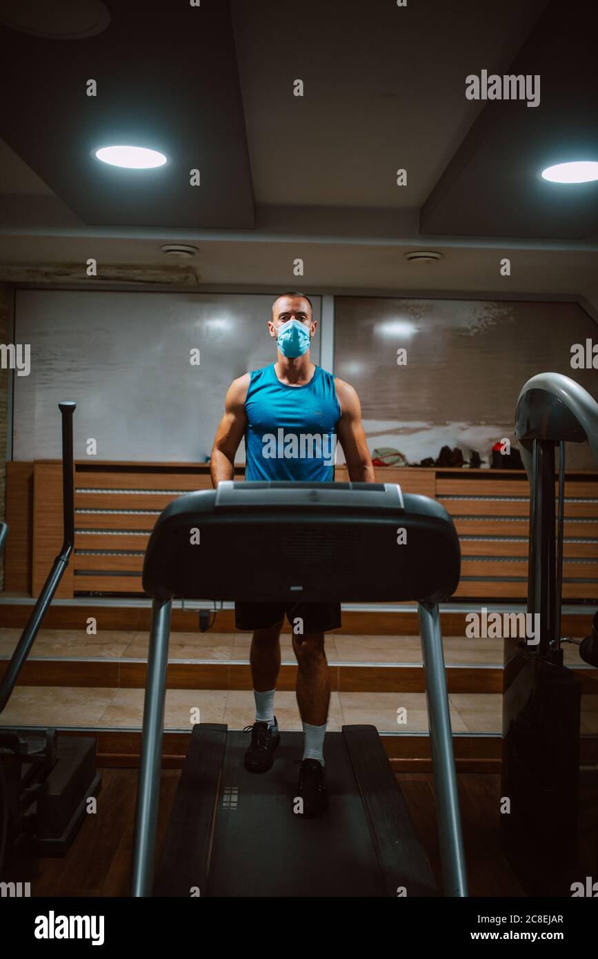 Young man treadmill mask hi-res stock photography and images - Alamy