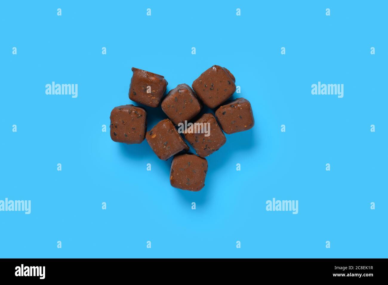 top view chocolate blocks with vanilla flavor ice cream inside on blue ...