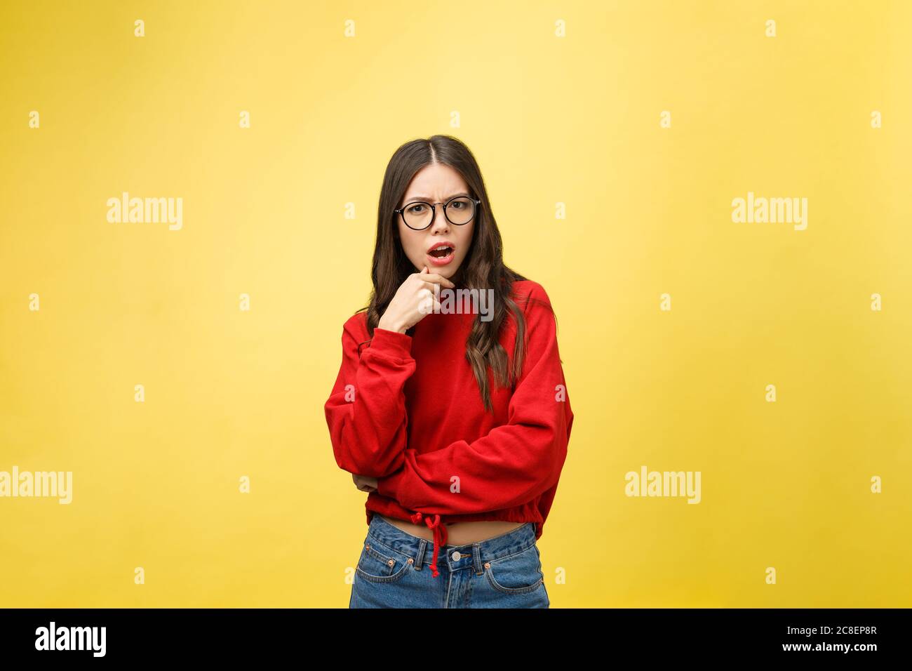 Portrait Happy Asian girl is surprised she is excited.Yellow background ...